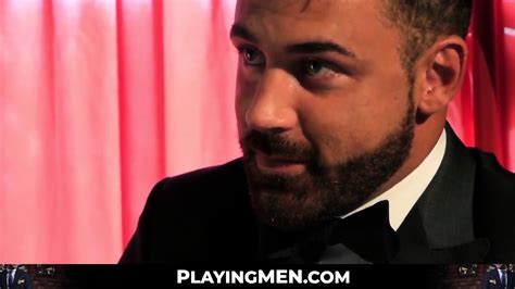 An Executive In A Suit Commands His Rather Bulky Worker