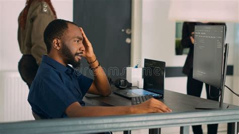 Software Programer Writing Program Code To Develop Database System