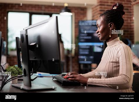 Confident African American Network Developer Engineering Application