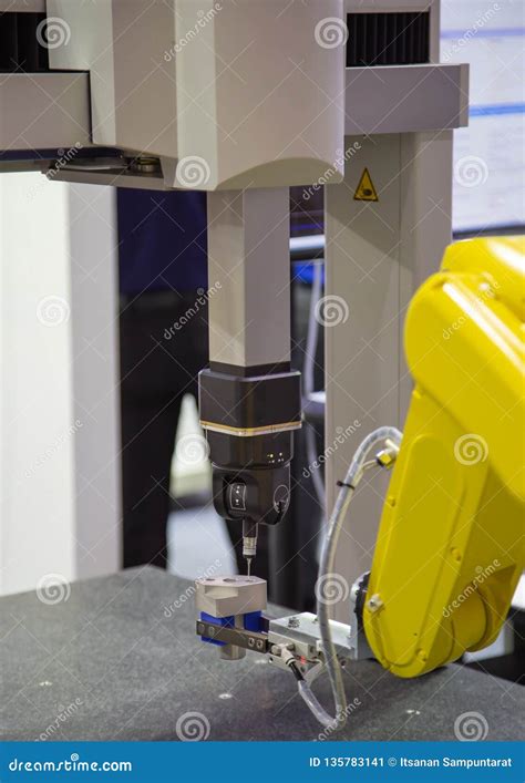 Robotic Arm Loading Workpiece To CMM Machine Stock Photo CartoonDealer