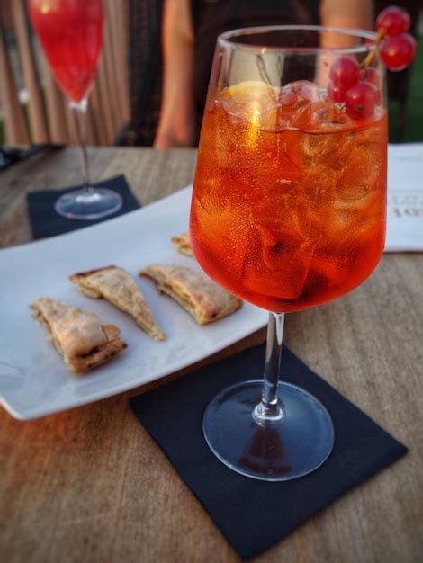 Premium Photo Close Up Of Vine In Glass On Table