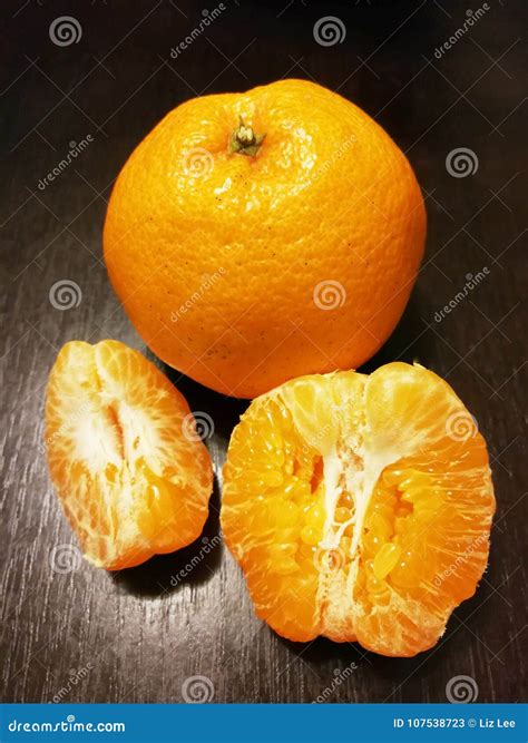 Peeled Mandarin Orange On Black Stock Image Image Of Background
