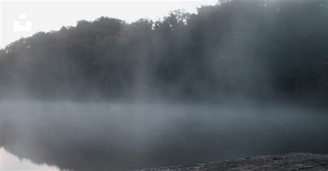 A Large Tornado In A Field Photo Free Fog Image On Unsplash