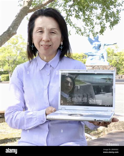 Hitomi Shirabe Head Of A Nagasaki Based Citizen Group That Supports Peace Education Holds A Pc