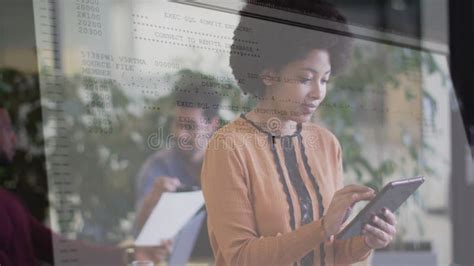 Using Tablet With Computer Code Overlay Woman In Modern Office