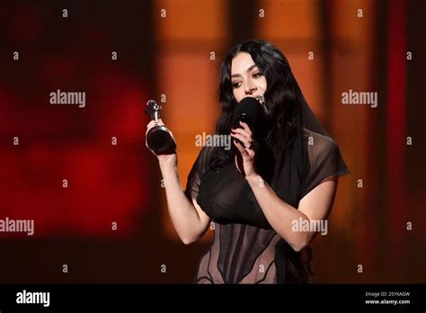 eds note nudity charli xcx accepts the song of the year award for