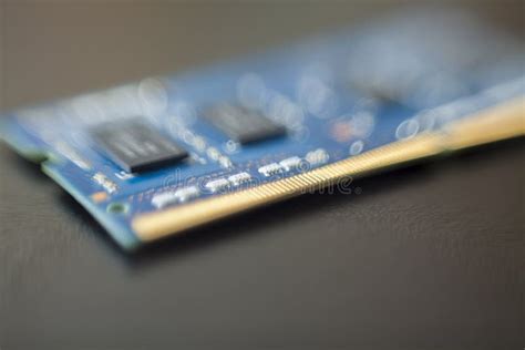 Computer Memory Chip Placed On Top Of A Black Table Connections And Circuits On Display Stock