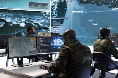 Military Specialist In High Tech Control Center Managing Satellite Surveillance Stock Image