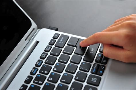 Premium Photo Woman Hand Touching Laptop Computer Keyboard Focus On The Keyboard