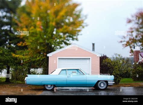 Cadillac Coupe Deville Parked In Front Of Garage For Sale Sign