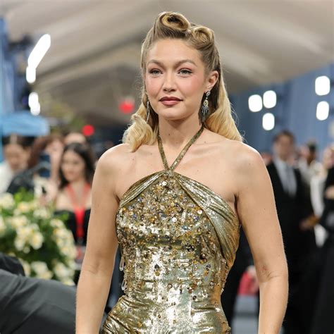 Gigi Hadid Wraps Herself In A Dhl Tape Mini Dress For Vetementss Paris
