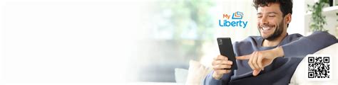 Smiling Man Using My Liberty App On His Smartphone With Qr Code For Quick Download