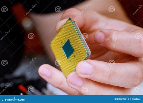Process Of Connecting The CPU To The Processor Socket On A Modern Computer Motherboard Stock