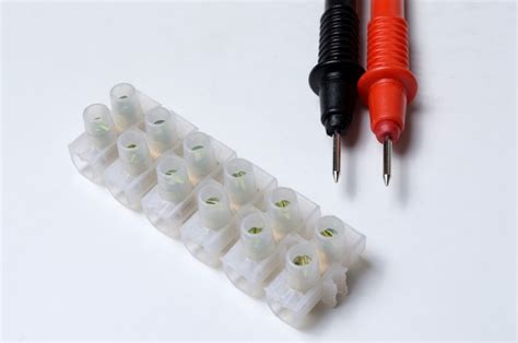 Premium Photo Multimeter Probes And Terminal Blocks Lie On A Light