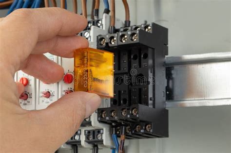 Inserting Relay Into Electrical Control Panel Stock Image Image Of Power Equipment 338985335