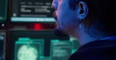 Vertical Video Hacker Drinking Coffee While Running Artificial Intelligence Spyware Software