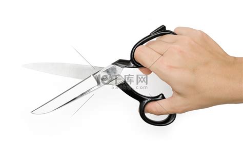 手拿剪刀高清摄影大图 千库网