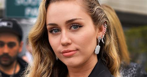 Miley Cyrus Kisses Selena Gomez On The Lips