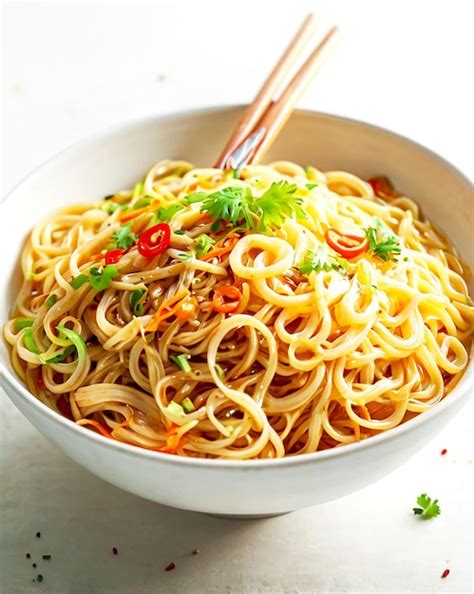 A Bowl Of Noodles With A Chopstick In It And A Chopstick In The Bowl Premium Ai Generated Image
