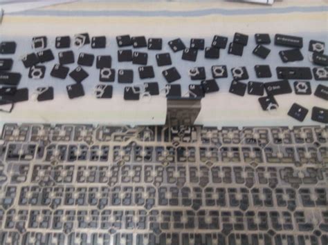 进水笔记本键盘部分按键失灵维修 百度知道