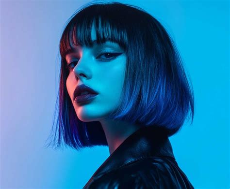 Medium Bob With Bangs Styled In Electric Blue Hue ArtFasad
