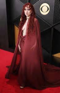 Chappell Roan Wears The Ultimate Sheer Gown Hanging From Nipple Rings