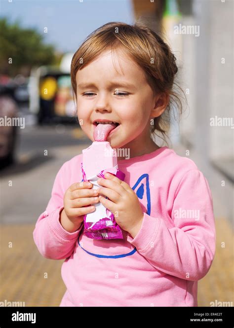 Girl Licking Ice Cream Hi Res Stock Photography And Images Alamy