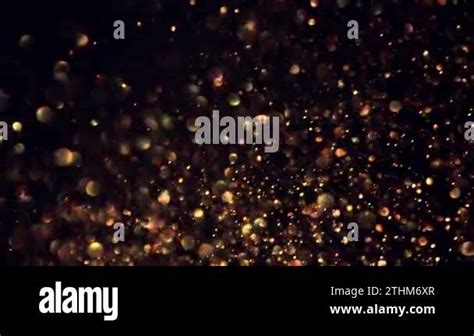 Golden Particles Bokeh Abstract Background With Shining Gold Floating Dust Particles Flare Star