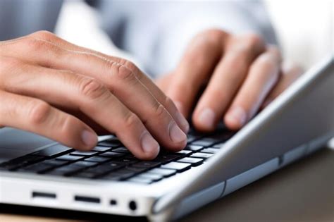 Premium Ai Image Closeup Shot Of An Unrecognizable Man Typing On A