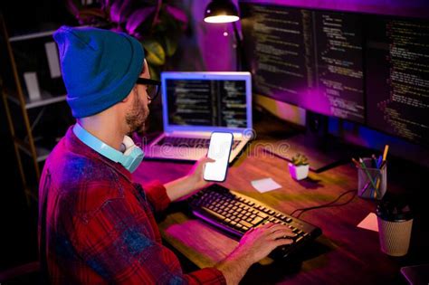 Photo Of Serious Confident Coder Dressed Hat Eyewear Creating Chatting Modern Gadget Empty Space