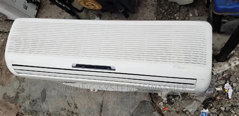 Low Voltage Lg 1hp Split Air Conditioner With Warranty In Lagos Island