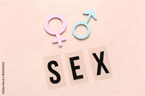 Word Sex With Male And Female Symbols On Pink Background Sex Education