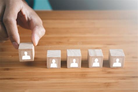 Wooden Block Of Staff Icons Teamwork And Organization Concept Stock