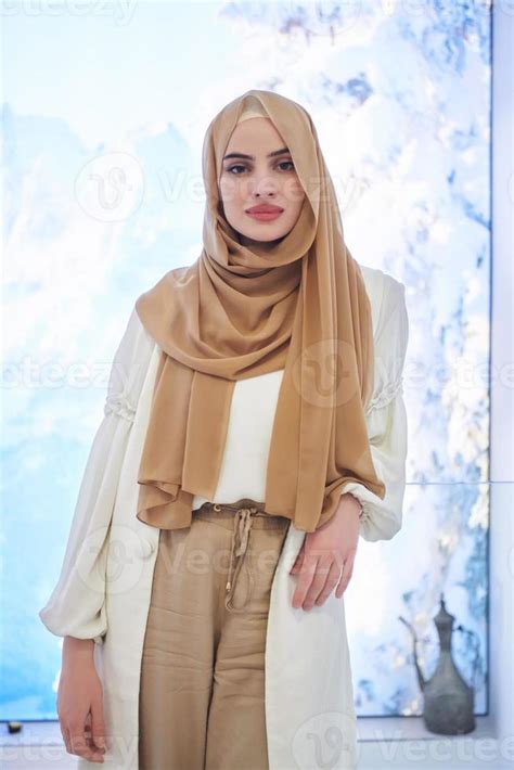 Girl Wearing Hijab Posing On Winter Concept Background 11000674 Stock