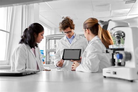 Scientists With Tablet Pc Working In Laboratory Stock Image Image Of Screen Discovery 253546033