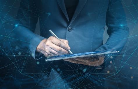 Premium Photo Businessman Using Tablet Analyzing Sales Data And Economic Growth Graph Chart