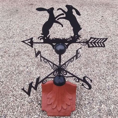 Boxing Hares Weathervane On A Ridge Tile Fitting With Multiple Angle