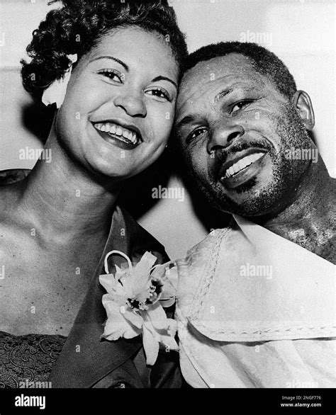 Light Heavyweight Boxing Champion Archie Moore Poses With His Wife