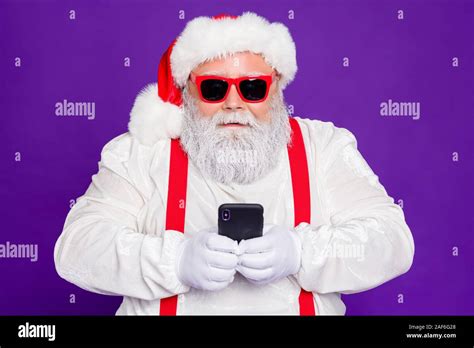 Photo Of Grey Haired Santa Father Holding Telephone Modern Technology