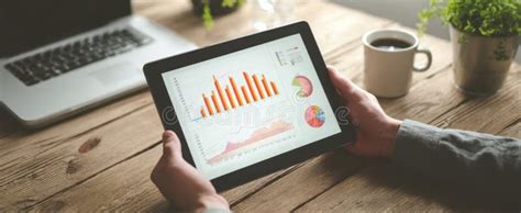 The Tablet Displaying Interactive Graphs And Charts For Business Analysis And Insights Ai