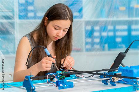 Babegirl In The Classroom Design And Development Of Robots Stock Photo Adobe Stock
