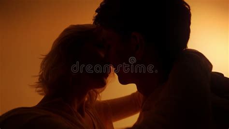 Lovely Couple Kissing And Touching Each Other During Romantic Date In