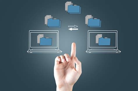 Premium Photo Transferring Files Between Laptops On A Virtual Screen