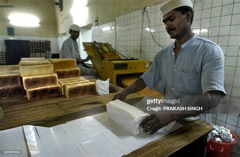 A Prisoner Of The Tihar Central Prison Packs Breads In One Of Its