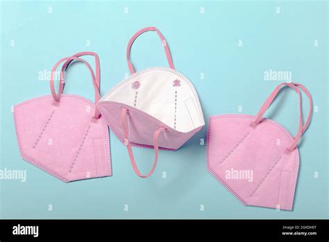 Pink Kn95 Or N95 Ffp2 Mask For Protection And Corona Virus On Pastel