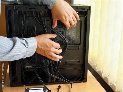 Assembling New Computer Setting Parts And Laying Wires In System Unit Housing Stock Foto