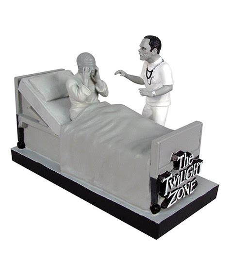 A Figurine Of A Man In Bed Talking To A Woman