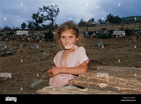 Albanian Girl In Windswept Rural Field Portrait Kukes Albania