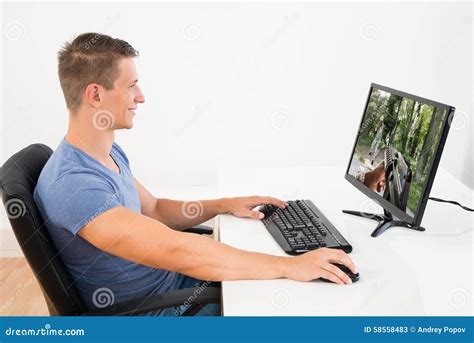 Man Playing Game On Desktop Computer Stock Photo Image 58558483
