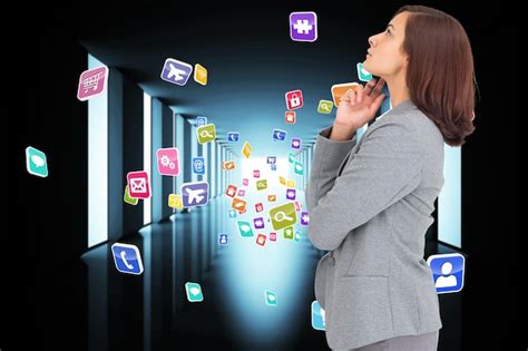 Premium Photo Concentrating Businesswoman Against Computing Application Icons